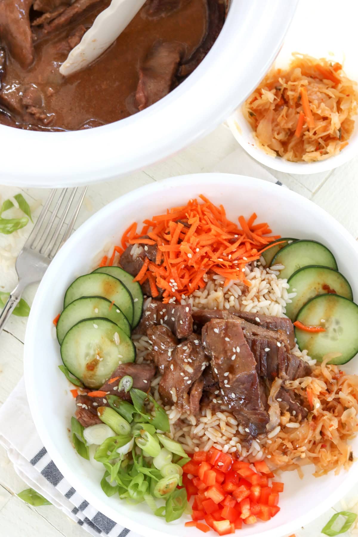 Crockpot Korean-Style BBQ Beef Bowls Recipe | Slow Cooked Eats